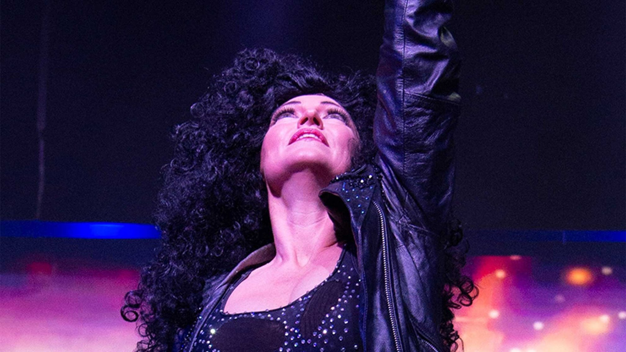 Elly Jarmain as Cher | Warner Hotels